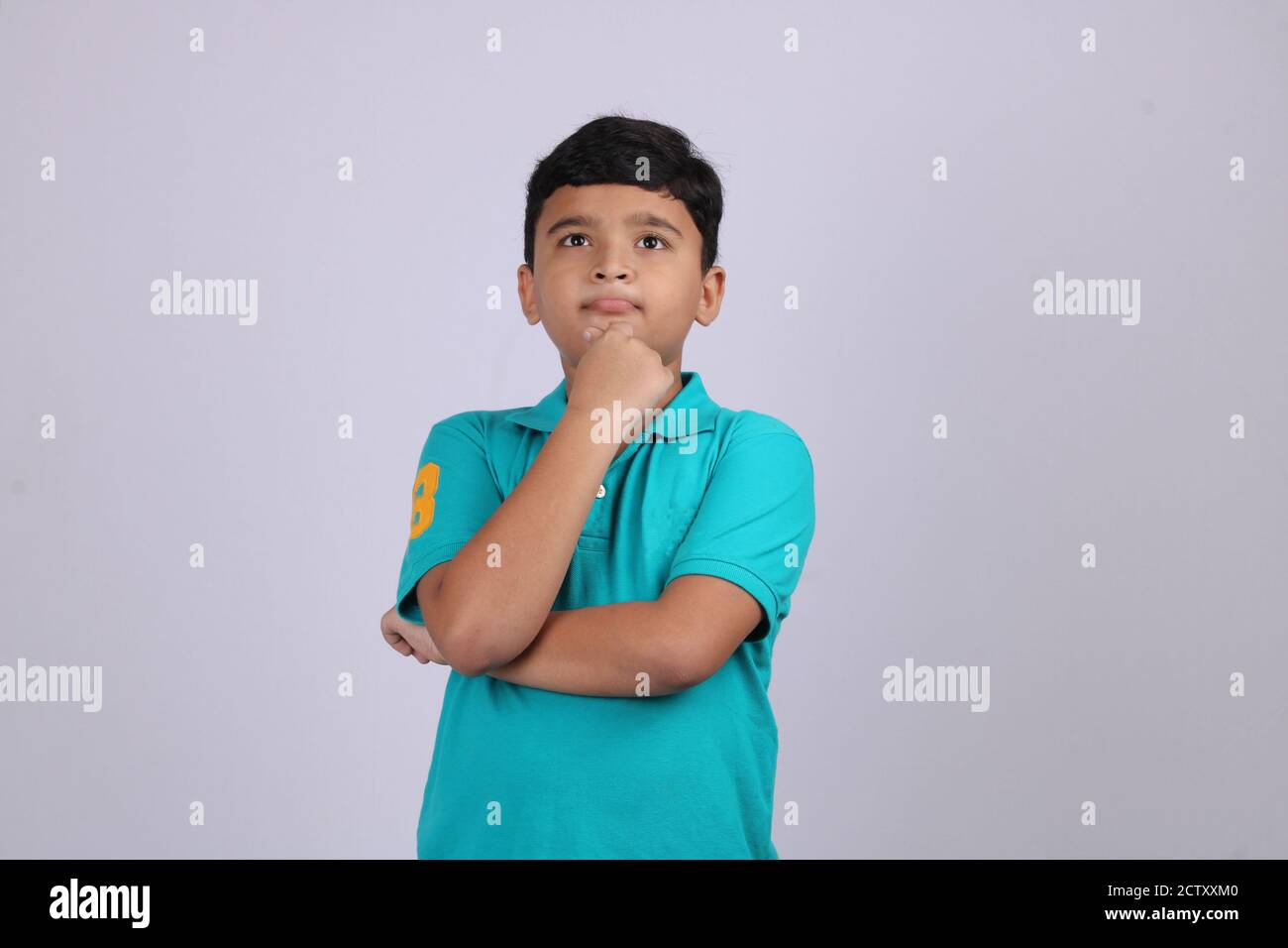 Thinking indian child deep in thought concept for confusion ...