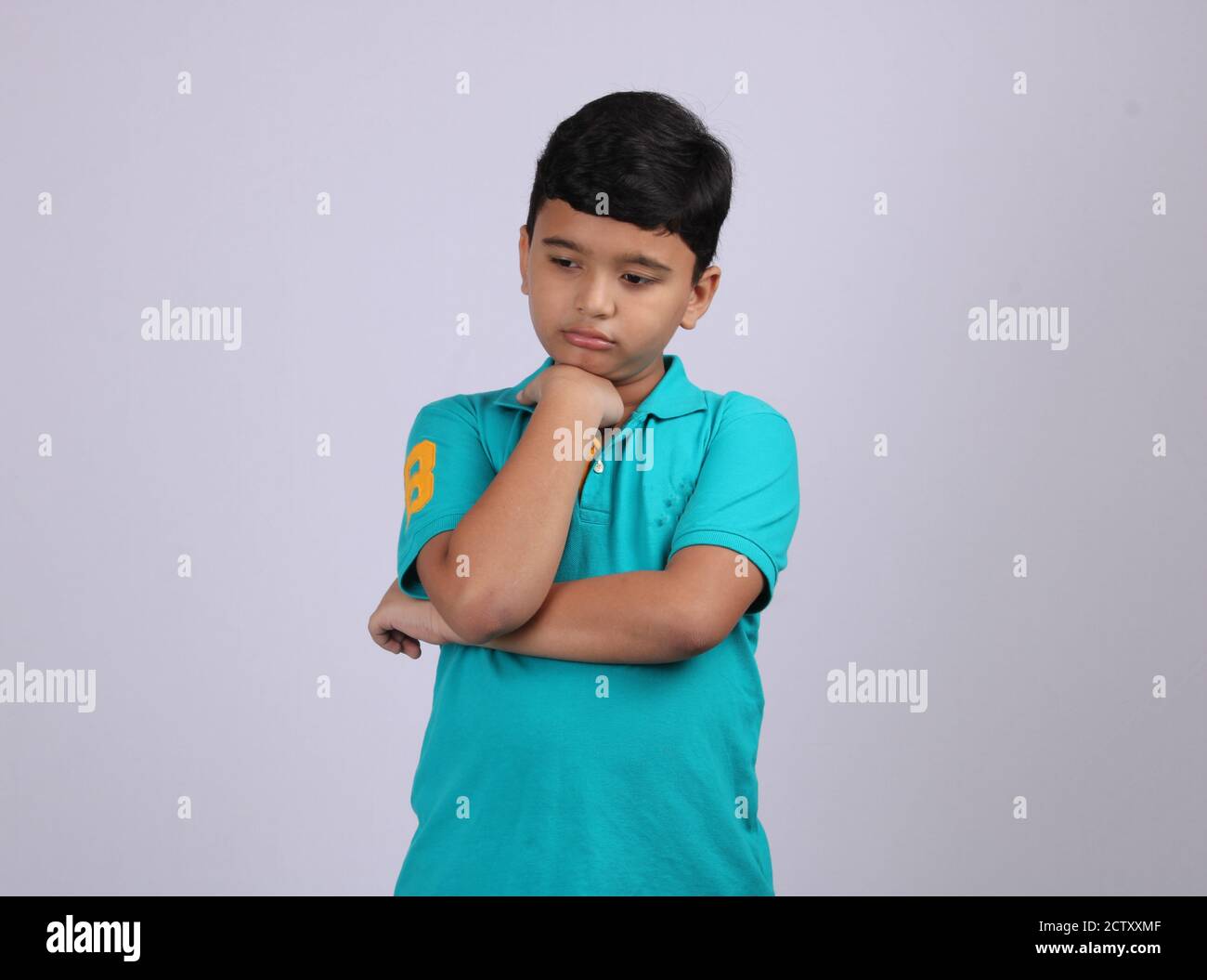 Thinking indian child deep in thought concept for confusion ...