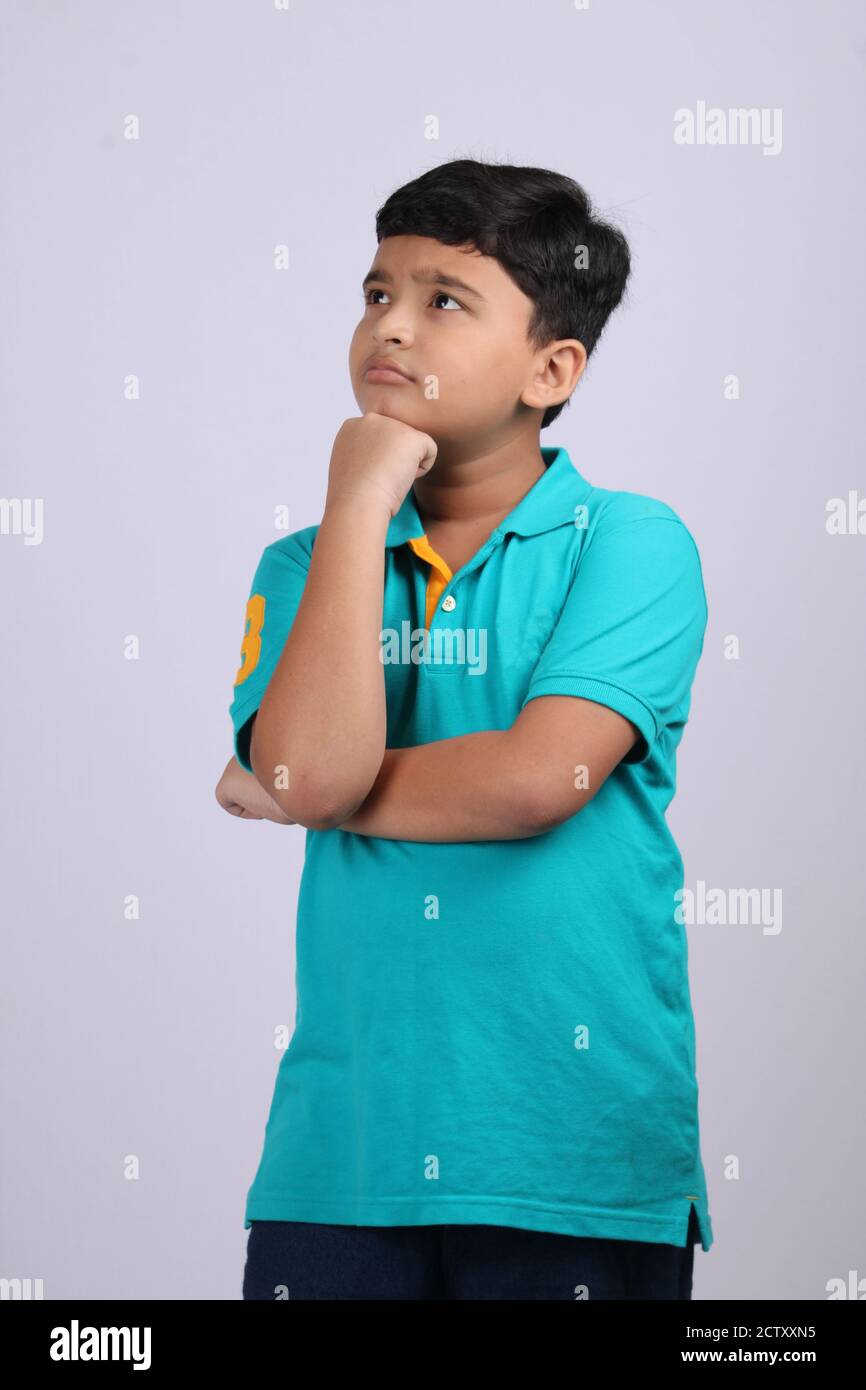 Thinking indian child deep in thought concept for confusion ...