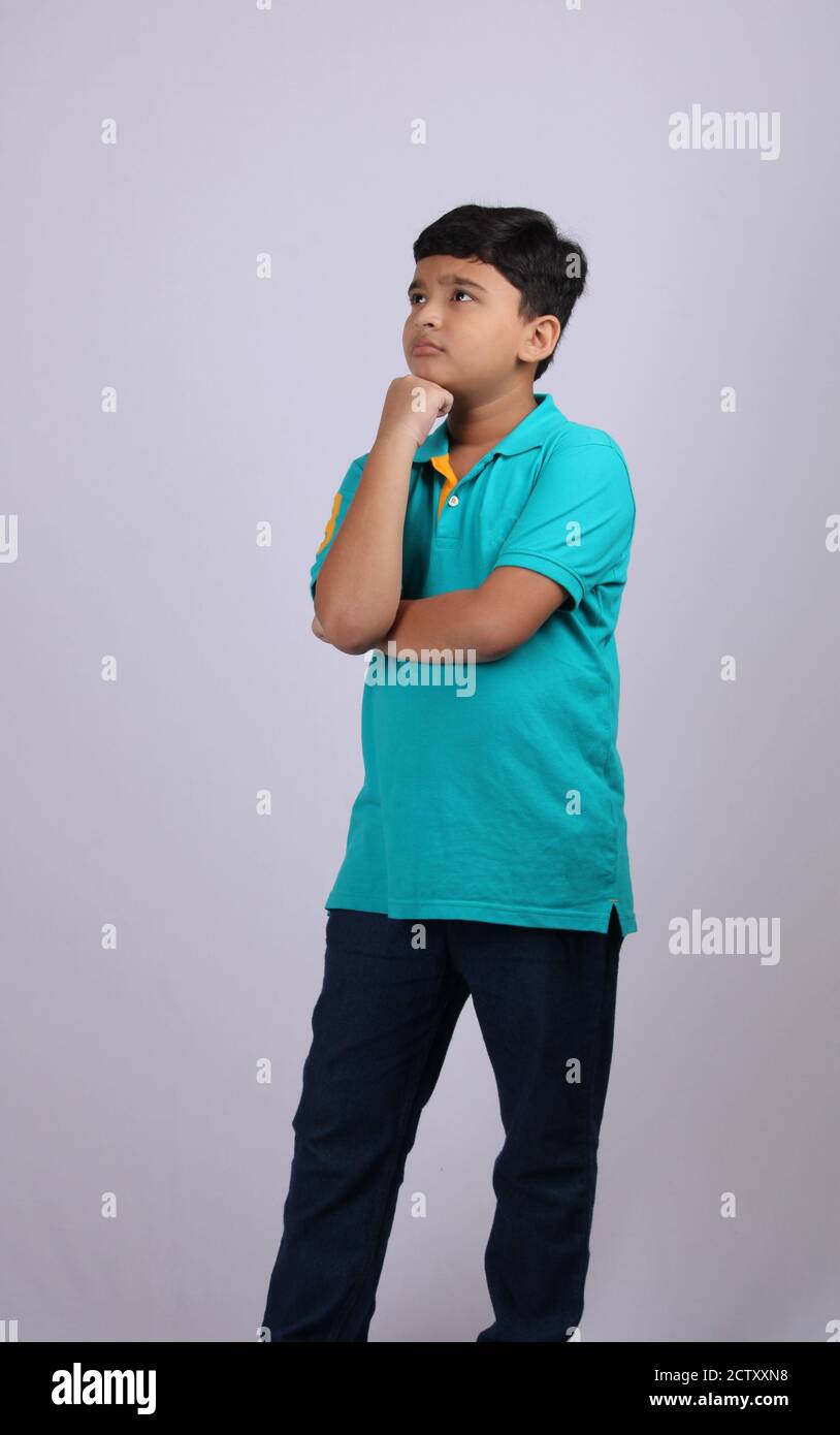 Thinking indian child deep in thought concept for confusion ...