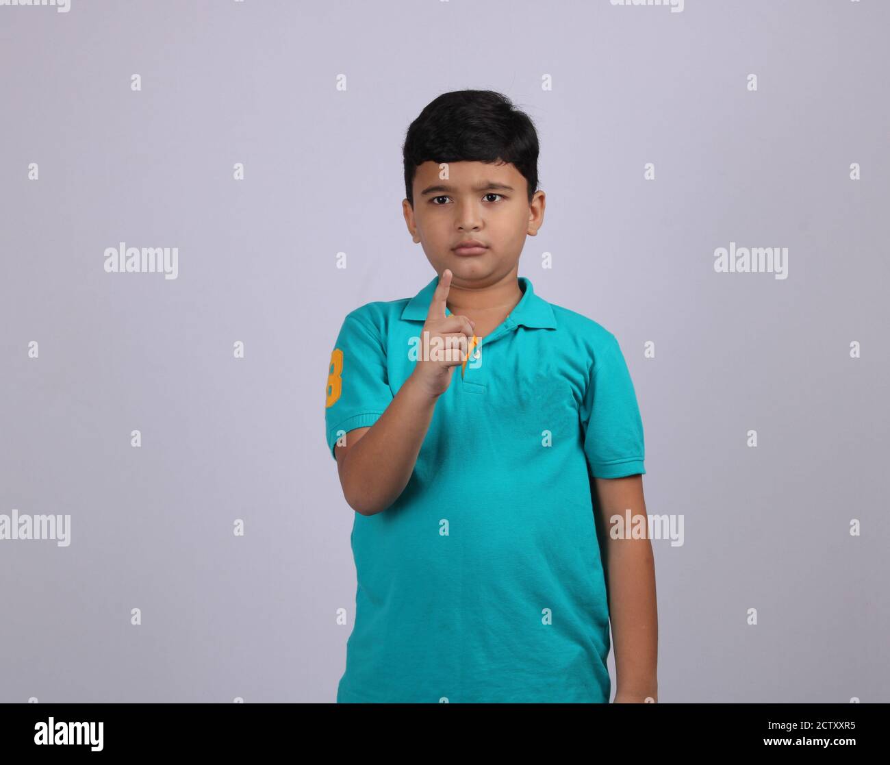 Boy pointing hand hi-res stock photography and images - Alamy