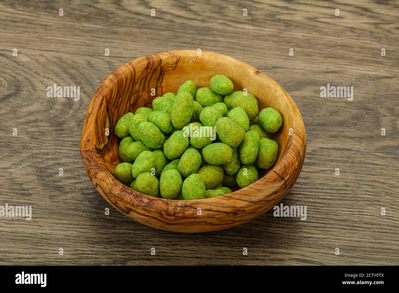 Spicy wasabi peanuts snack in the bowl Stock Photo - Alamy
