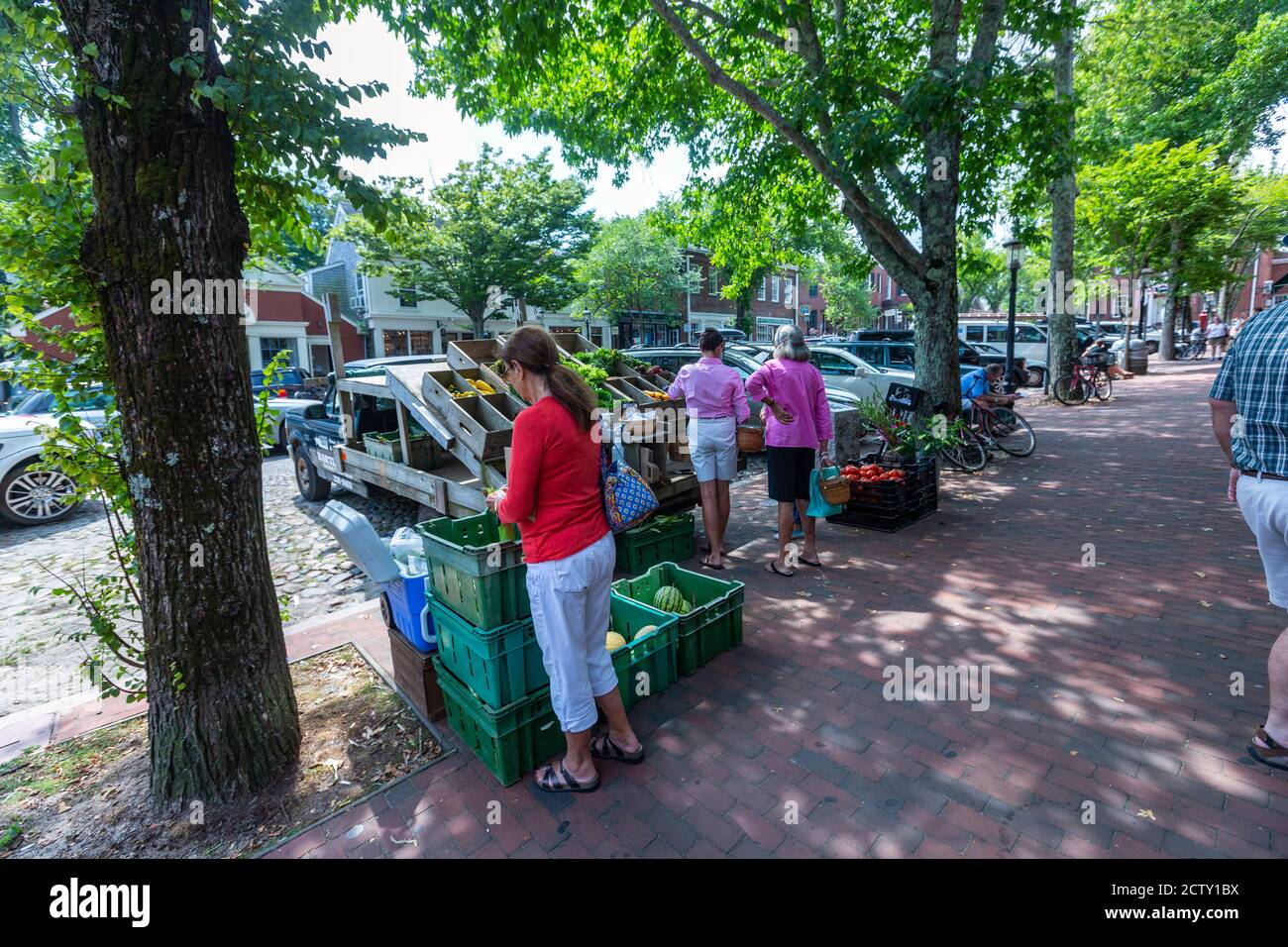 The cobblestone Main Street in historic downtown Nantucket, Nantucket ...