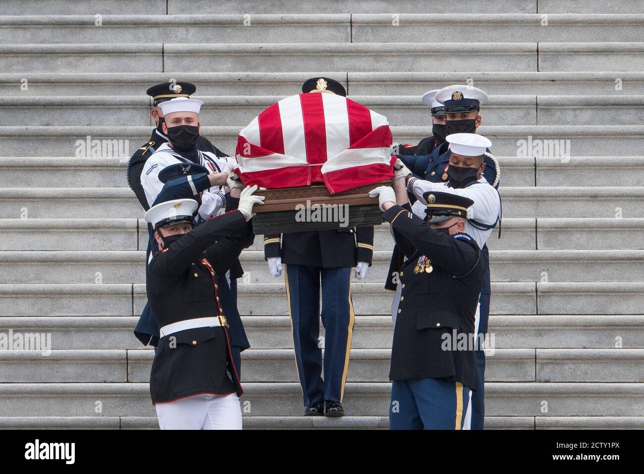 The casket carrying Supreme Court Justice Ruth Bader Ginsburg departs ...