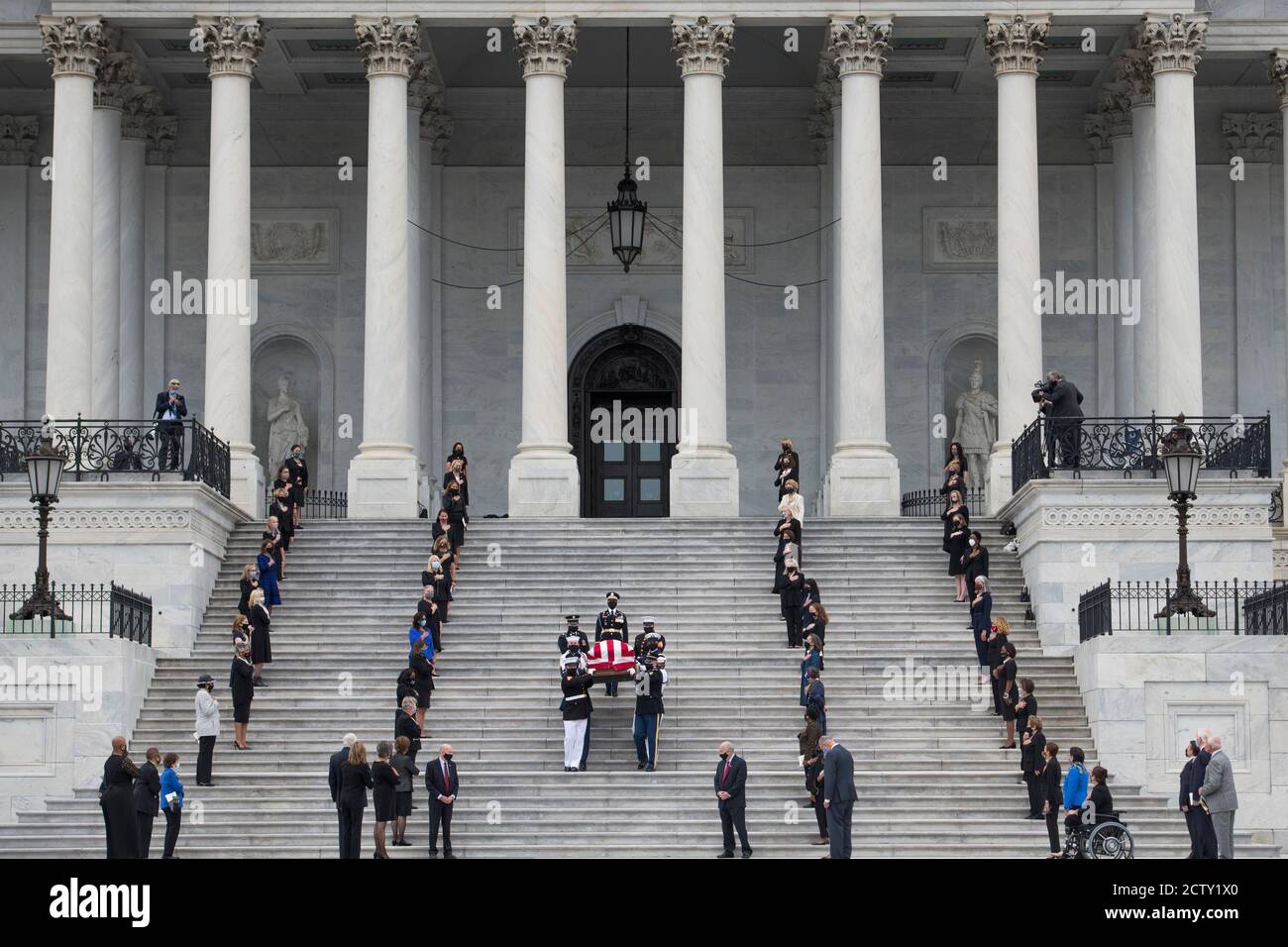 The casket carrying Supreme Court Justice Ruth Bader Ginsburg departs ...