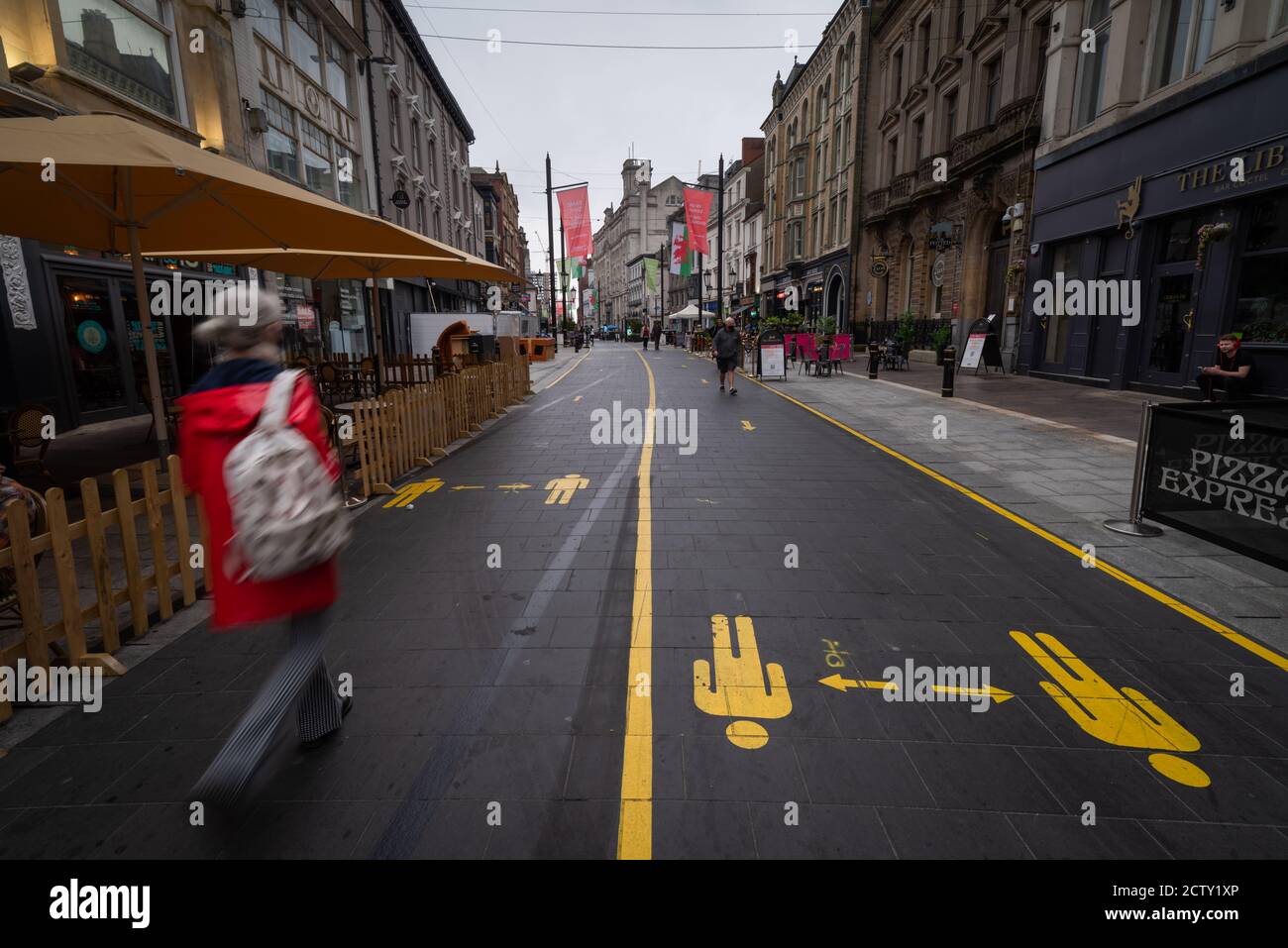 Cardiff Covid-19 lockdown social distance pavement markings Stock Photo ...