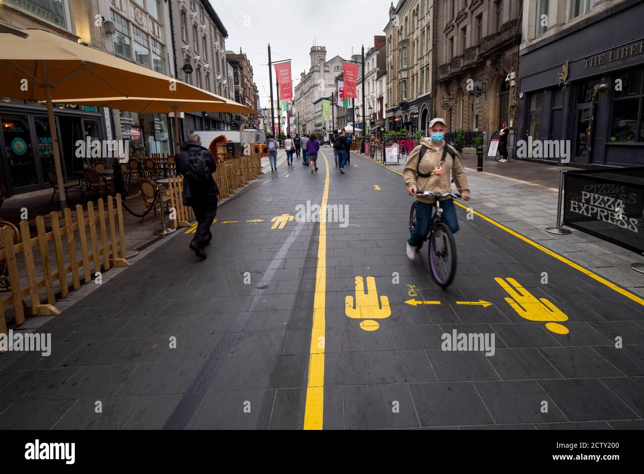 Cardiff Covid-19 lockdown social distance pavement markings Stock Photo ...