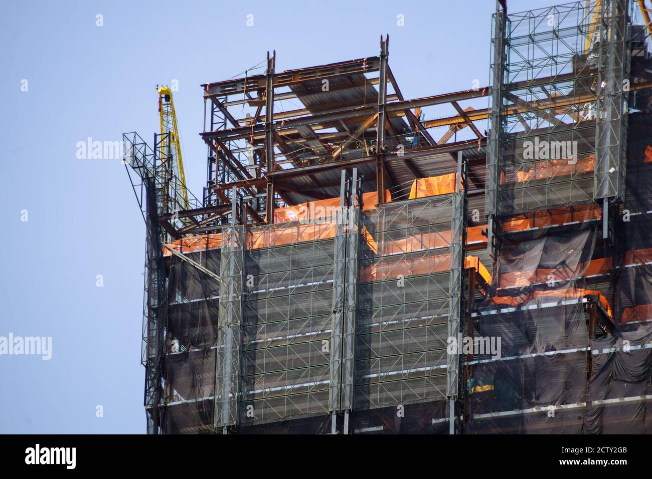 Construction site with crane and multi level commercial high rise ...