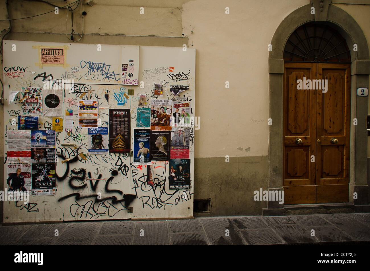 Doorway and graffiti in Florence, Italy Stock Photo - Alamy