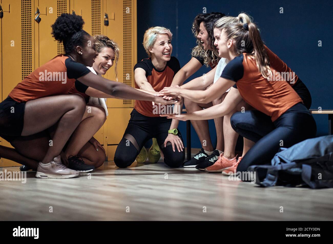 Female team building up togetherness before the match Stock Photo - Alamy
