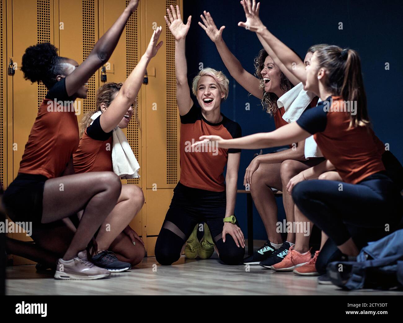 Female team ready for the match in a locker room Stock Photo - Alamy