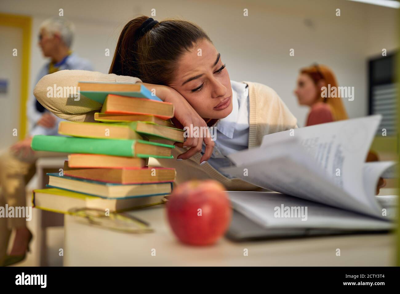 Tired female student at the lecture in the university classroom Stock ...