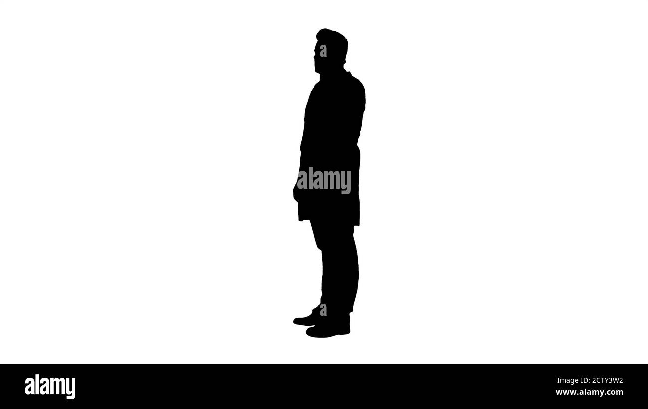 Silhouette Doctor making a serious phone call Stock Photo - Alamy