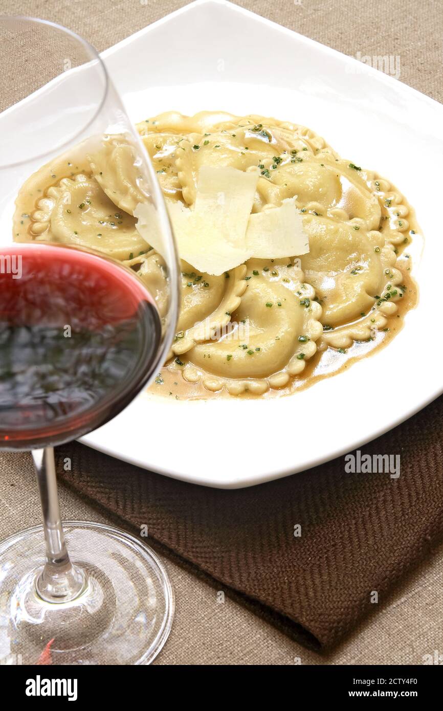 Glass red wine ravioli pasta hi-res stock photography and images - Alamy