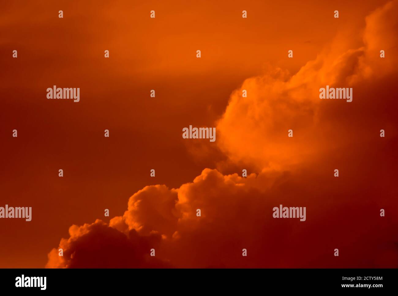 Cumulus cloud at sunset Stock Photo - Alamy