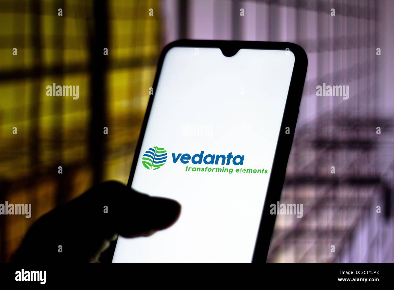 In this photo illustration the Vedanta Limited logo seen displayed on a ...