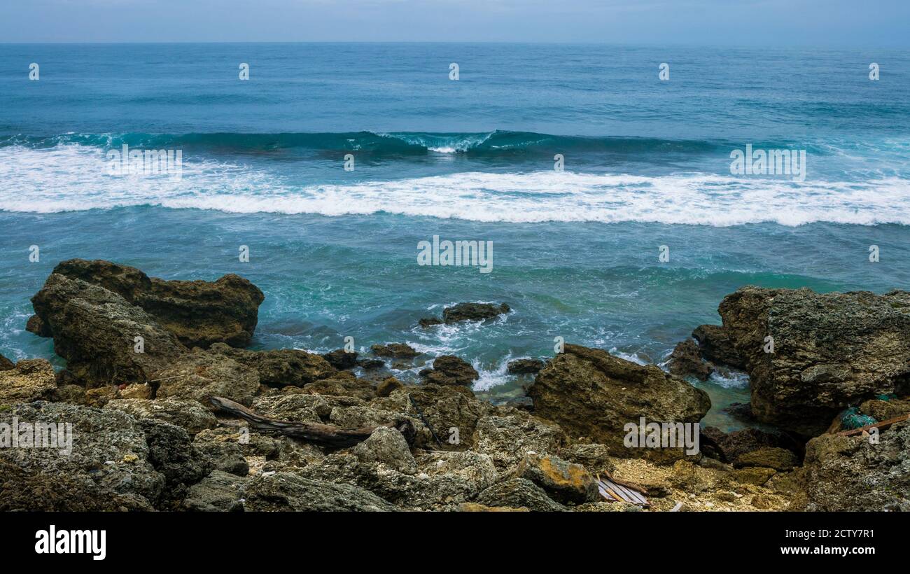 Ocean wave rolling towards with marine rocks in a coast of Taiwan ...