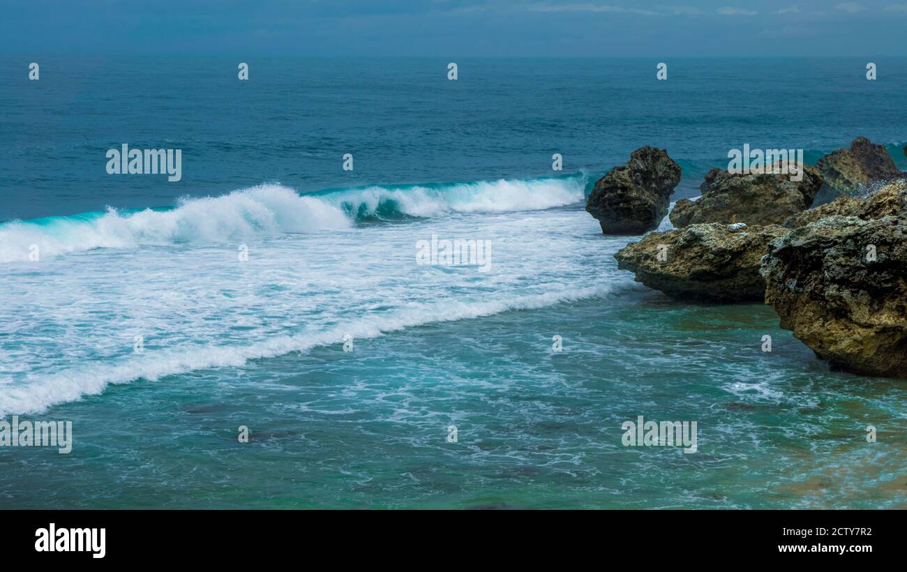 Ocean wave rolling towards with marine rocks in a coast of Taiwan ...