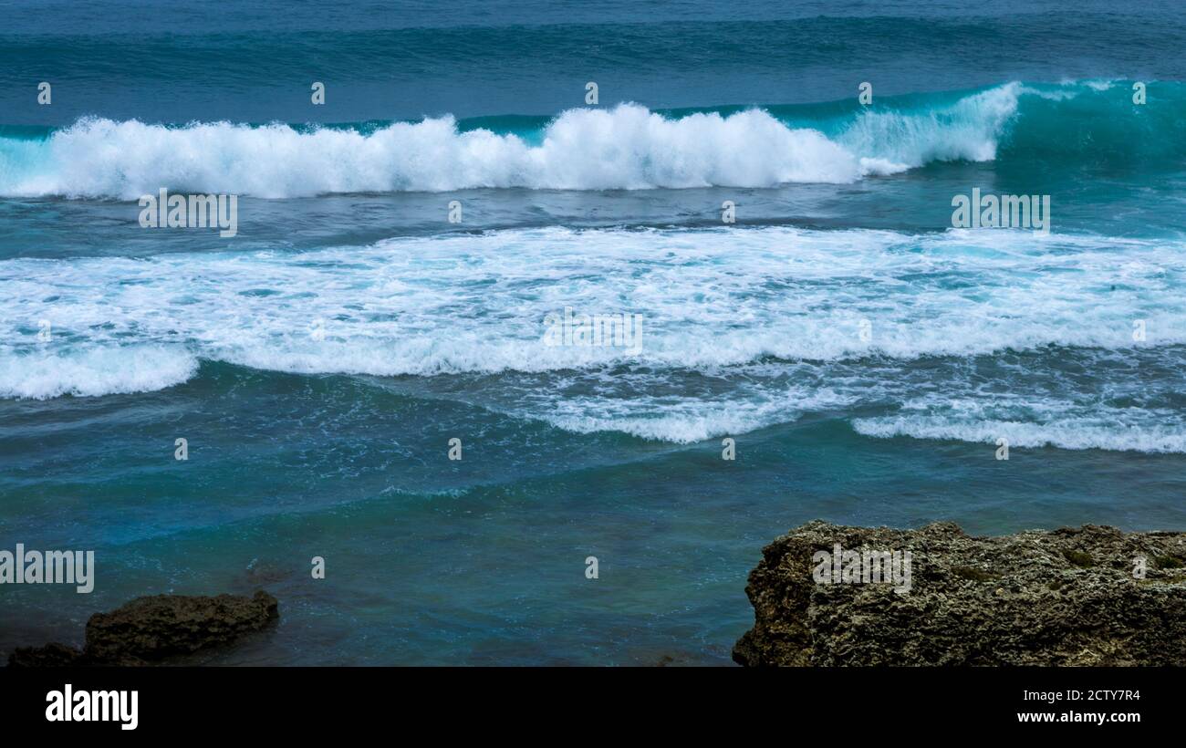 Ocean wave rolling towards with marine rocks in a coast of Taiwan ...