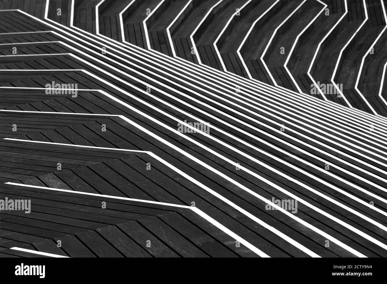 Wooden staircase designed in a complex way Stock Photo - Alamy