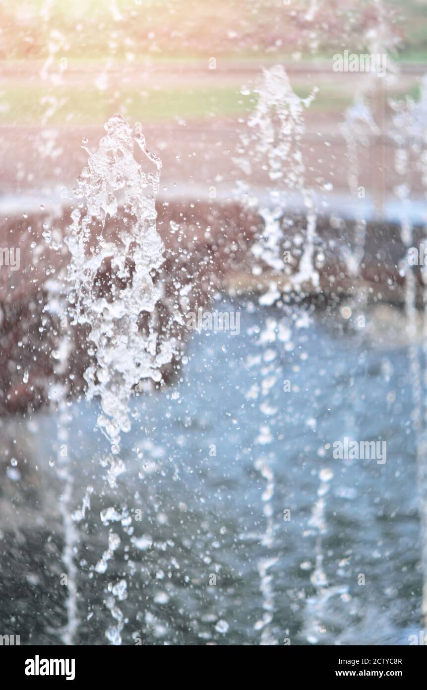 Splash water from fountain as an abstract background Stock Photo - Alamy