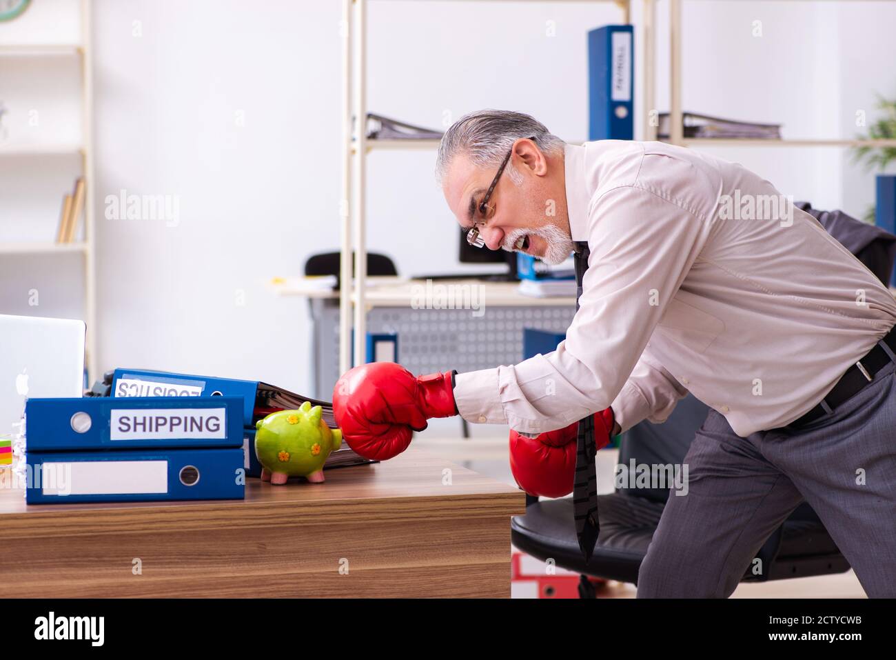 Businessman angry and furious at his workplace Stock Photo - Alamy