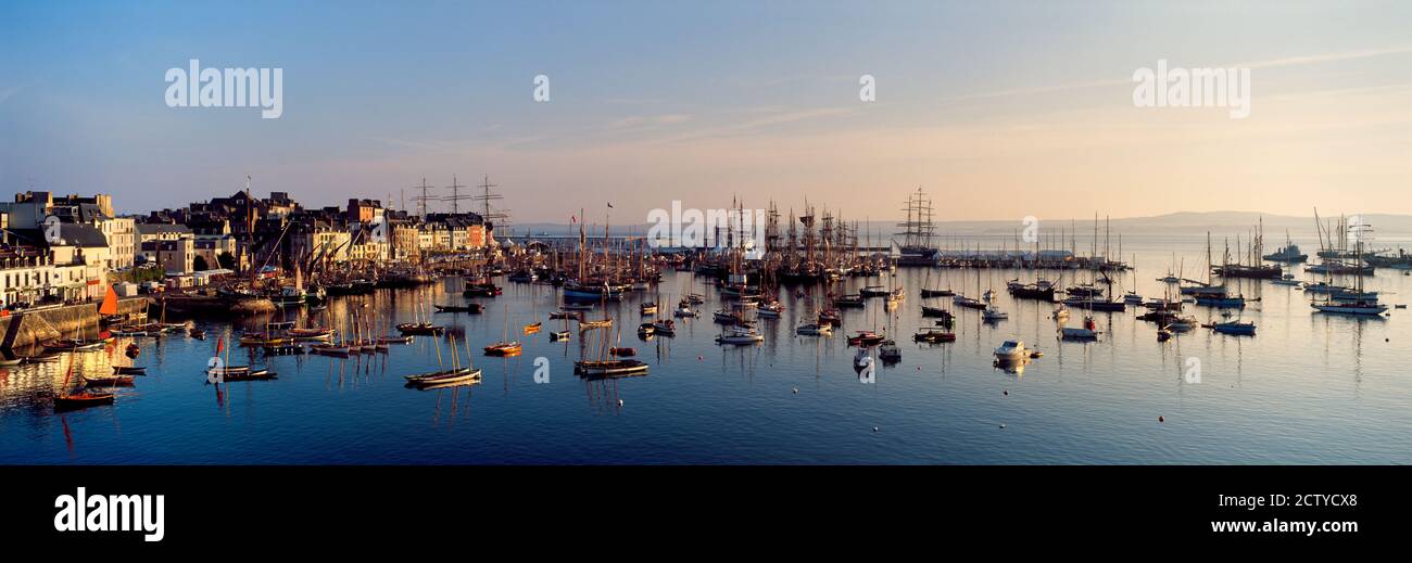 Tall Ships at a harbor at sunrise, Rosmeur Harbour, Douarnenez ...