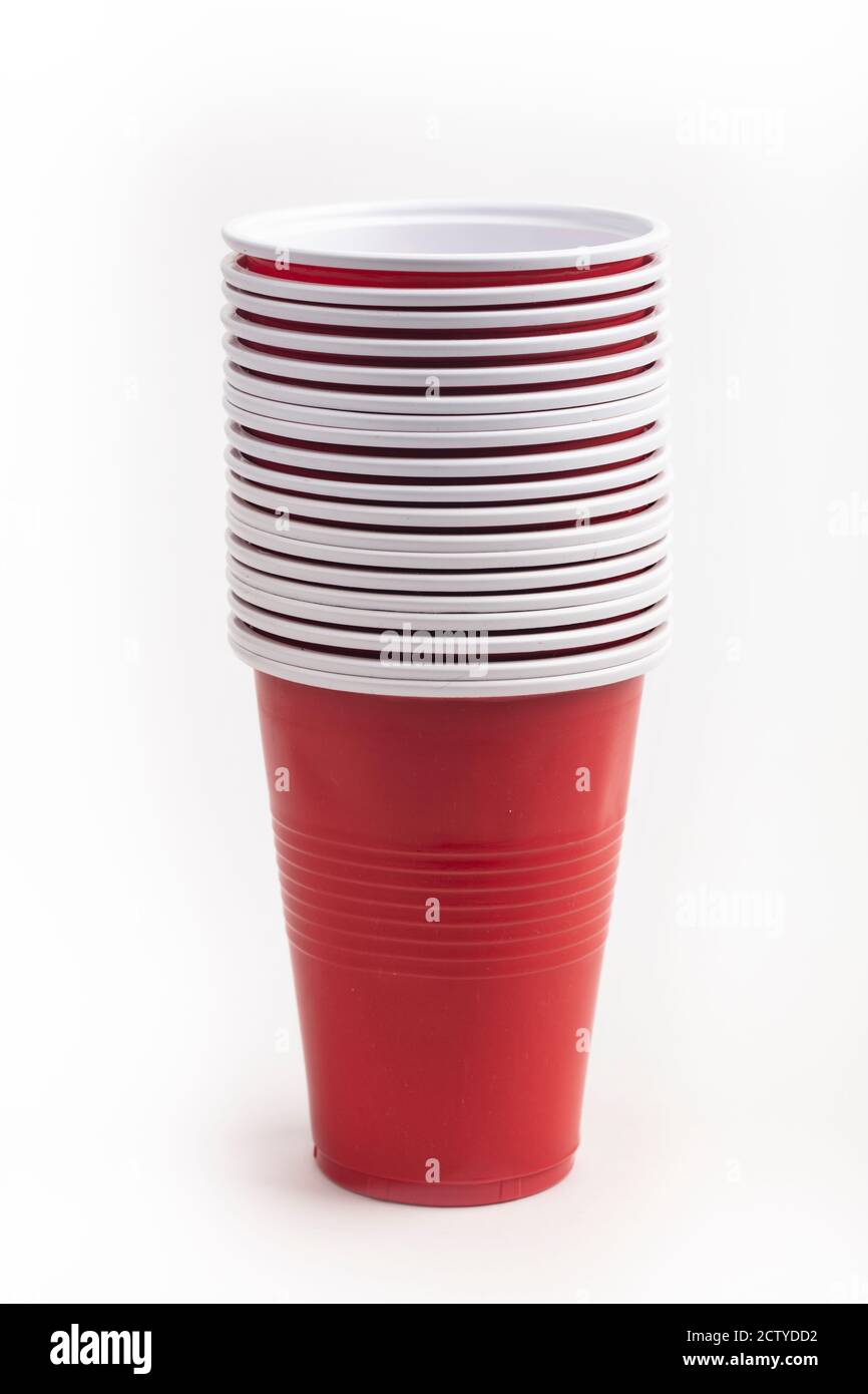 Stacked Red plastic cups isolated over white background Stock Photo - Alamy