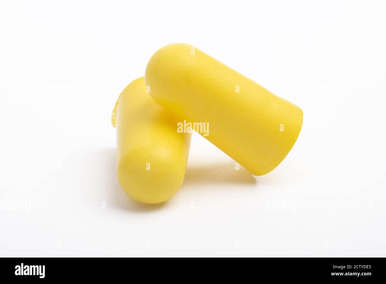 Yellow Ear plugs isolated on a white background Stock Photo - Alamy