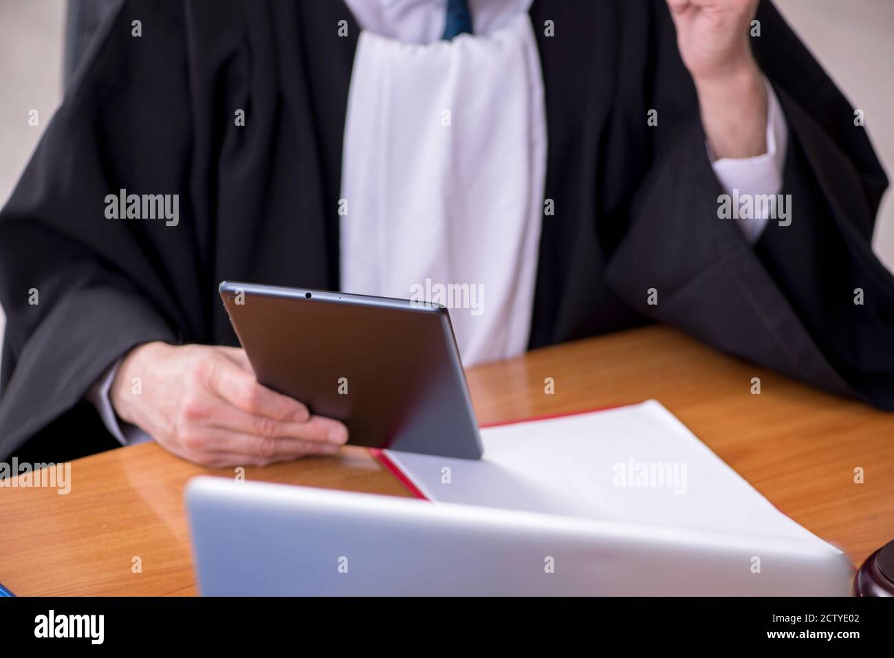 Old judge working in courthouse Stock Photo - Alamy