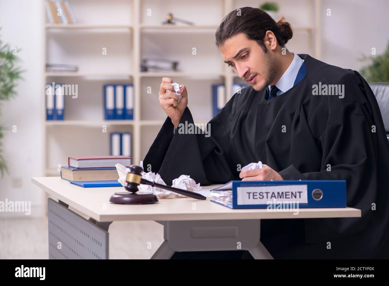 Young judge working in courthouse Stock Photo - Alamy