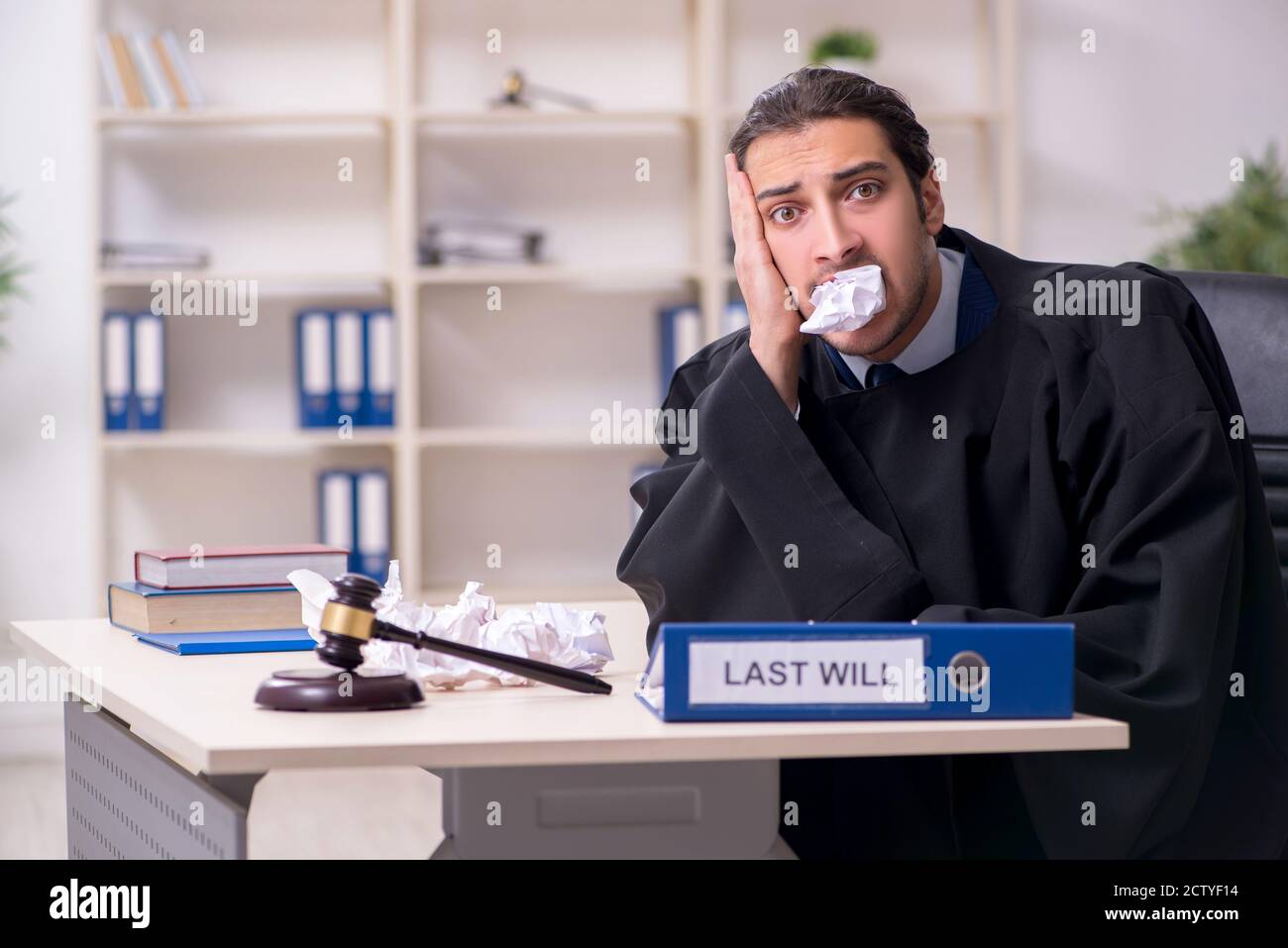 Young judge working in courthouse Stock Photo - Alamy