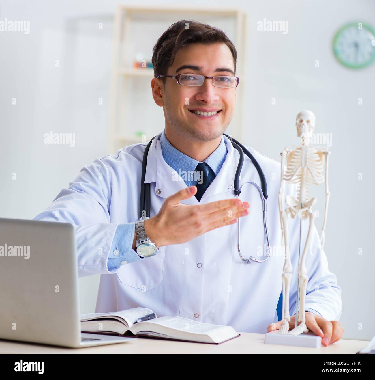 The doctor student studying the bones of skeleton Stock Photo - Alamy