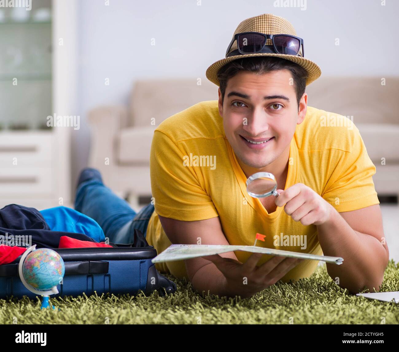 The man planning his vacation trip with map Stock Photo - Alamy