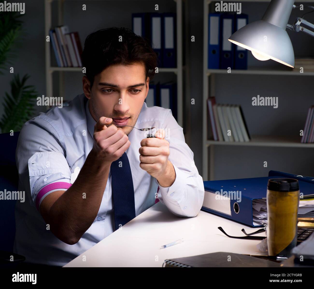 The employee relieving stress from overtime with drugs narcotics Stock ...