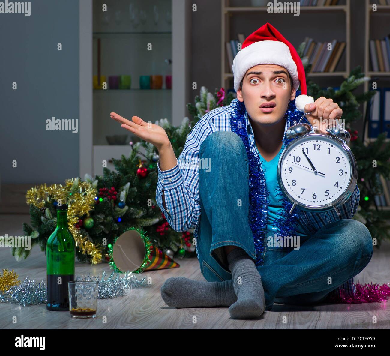 The man celebrating christmas at home alone Stock Photo - Alamy