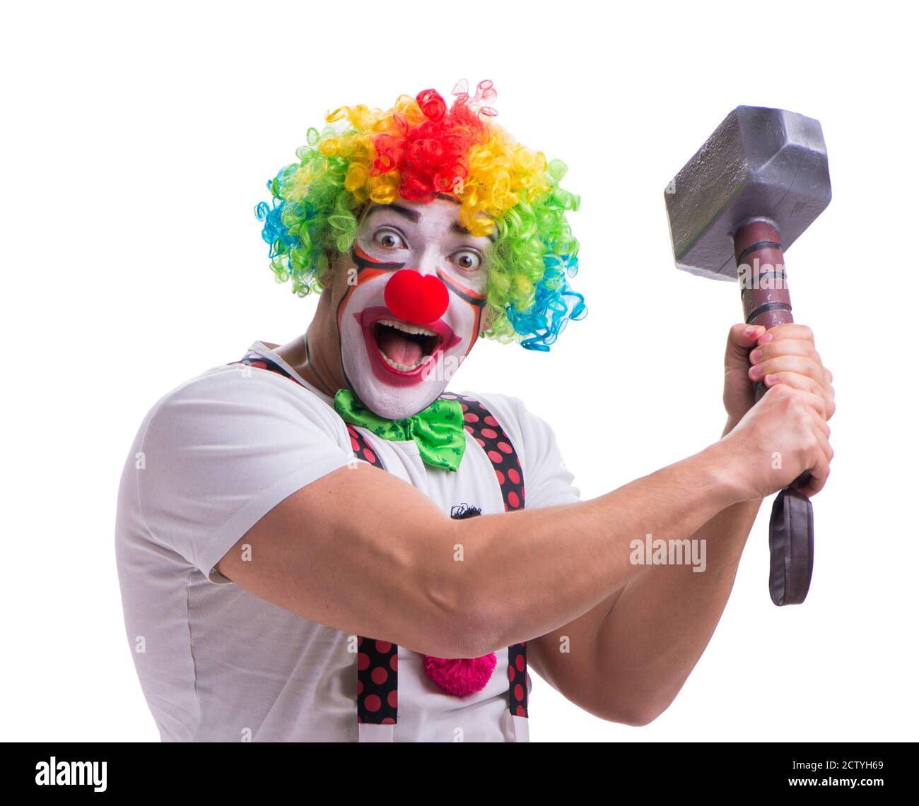 The funny clown with a hammer isolated on white background Stock Photo ...