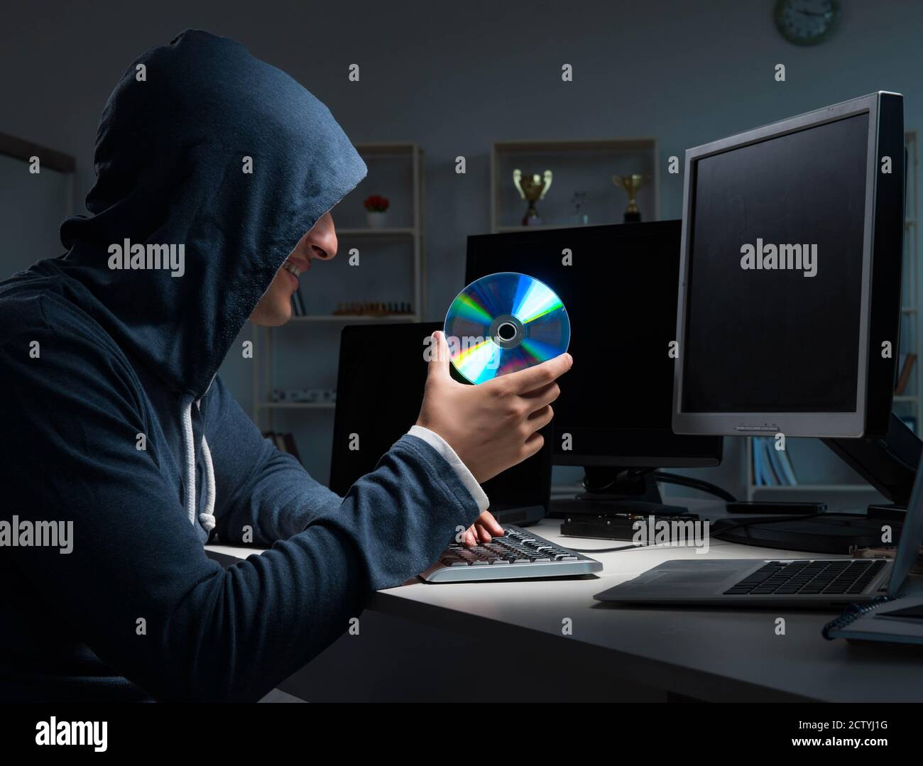 The hacker hacking computer at night Stock Photo - Alamy
