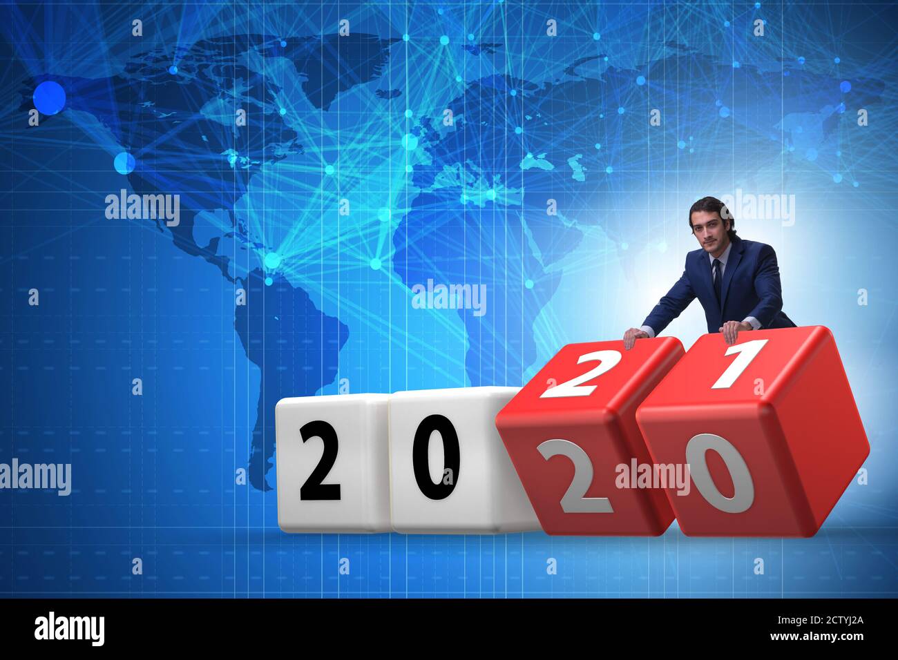 Businessman turning year from 2020 to 2021 Stock Photo - Alamy