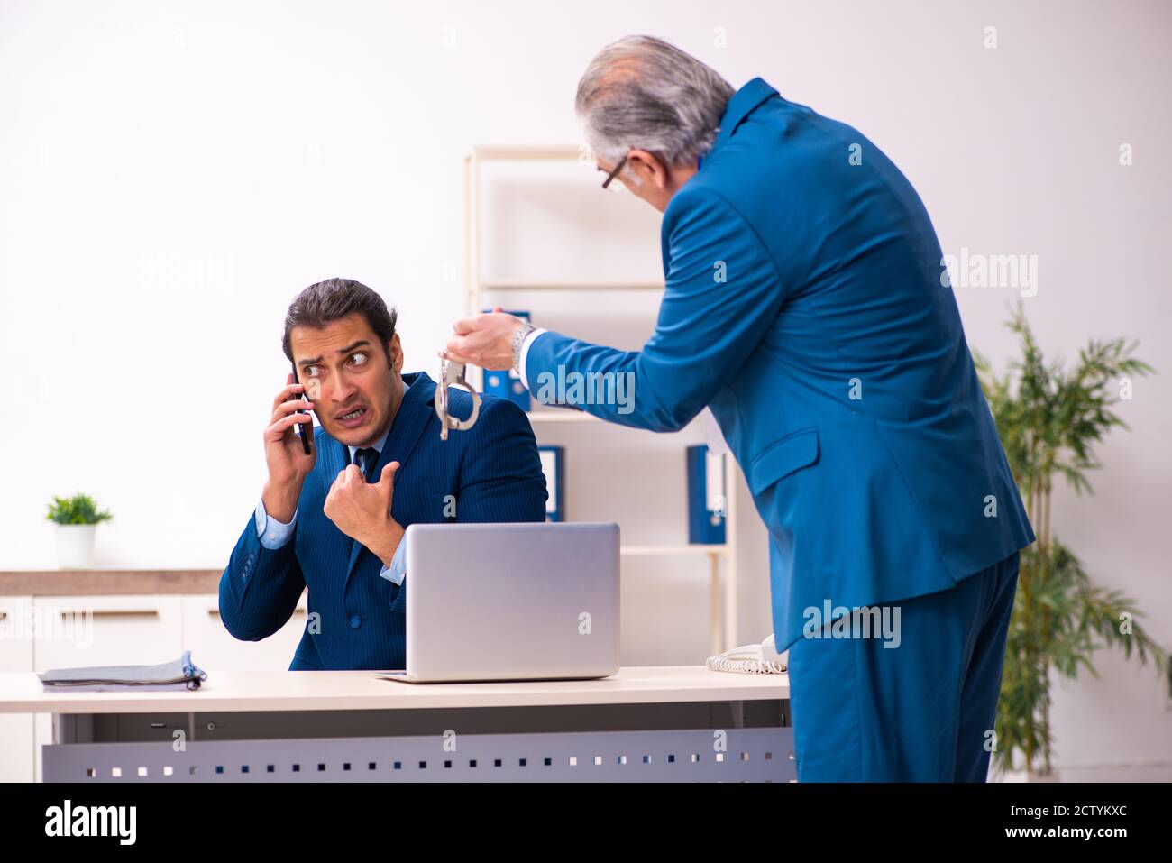 Officer talking to suspect in handcuffs hi-res stock photography and ...
