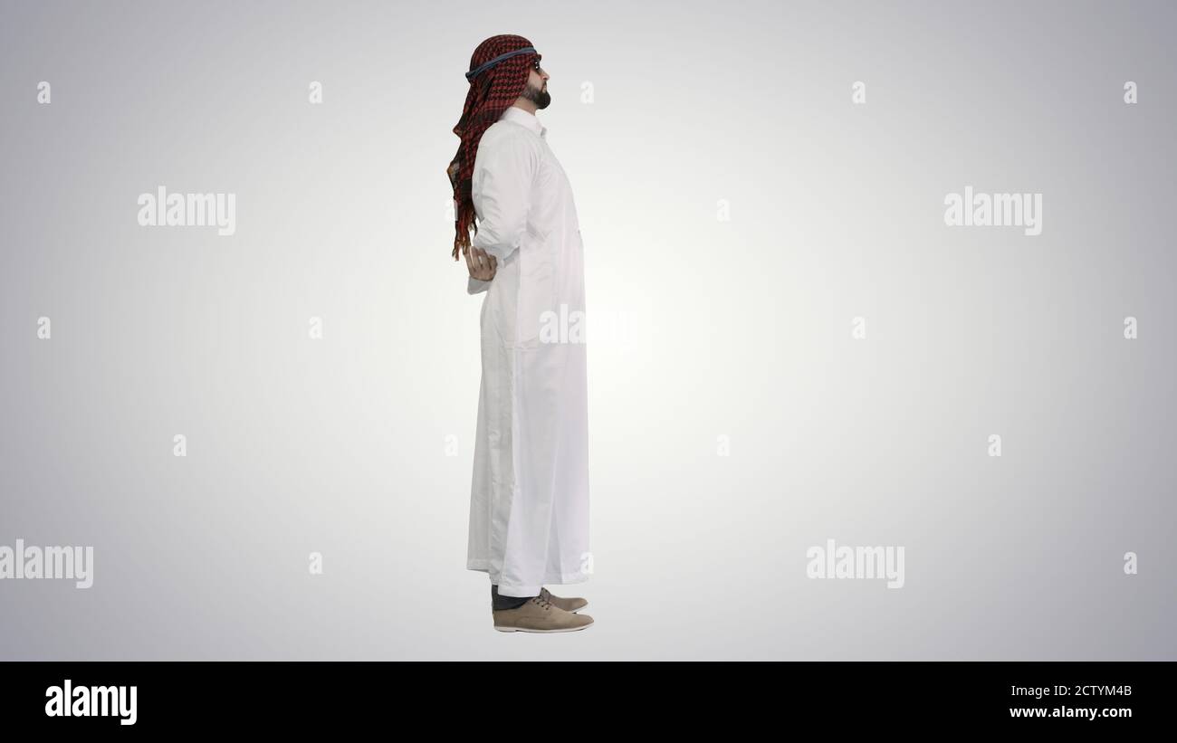 Cool sheikh in sunglasses posing on gradient background Stock Photo - Alamy