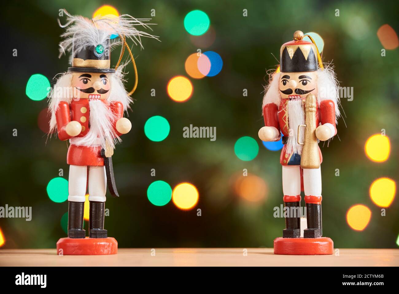 Pair of traditional red and white Christmas nutcrackers with a green ...