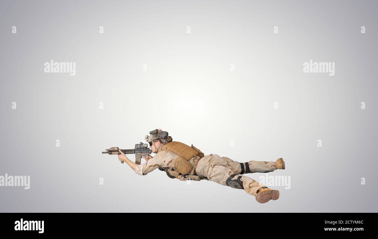 Soldier taking lying position and aiming at a target from automa Stock ...