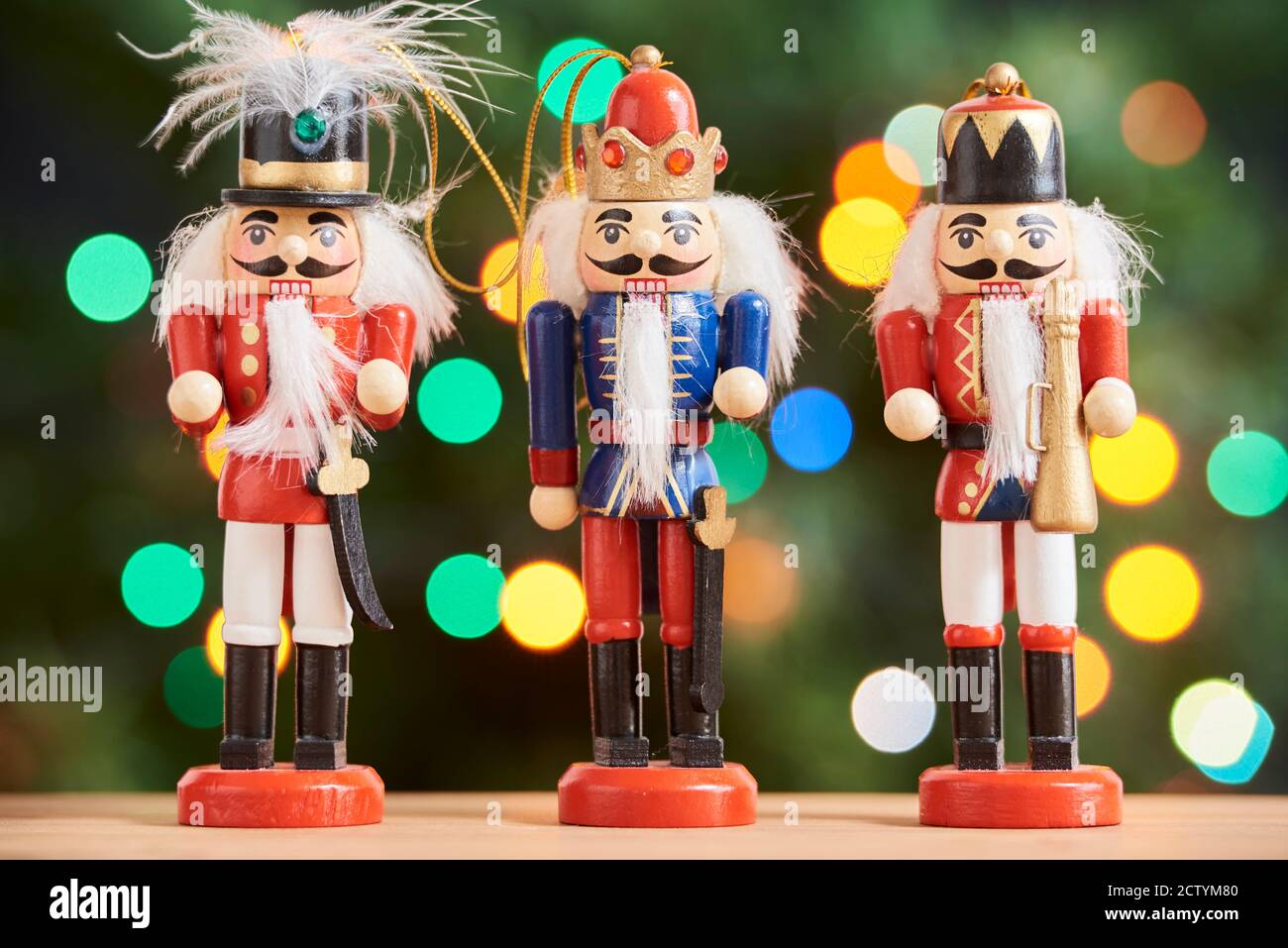 Traditional colorful wooden Christmas nutcrackers with a green ...