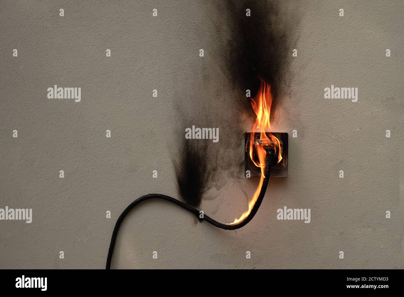 On fire electric wire plug Receptacle on the concrete wall exposed ...