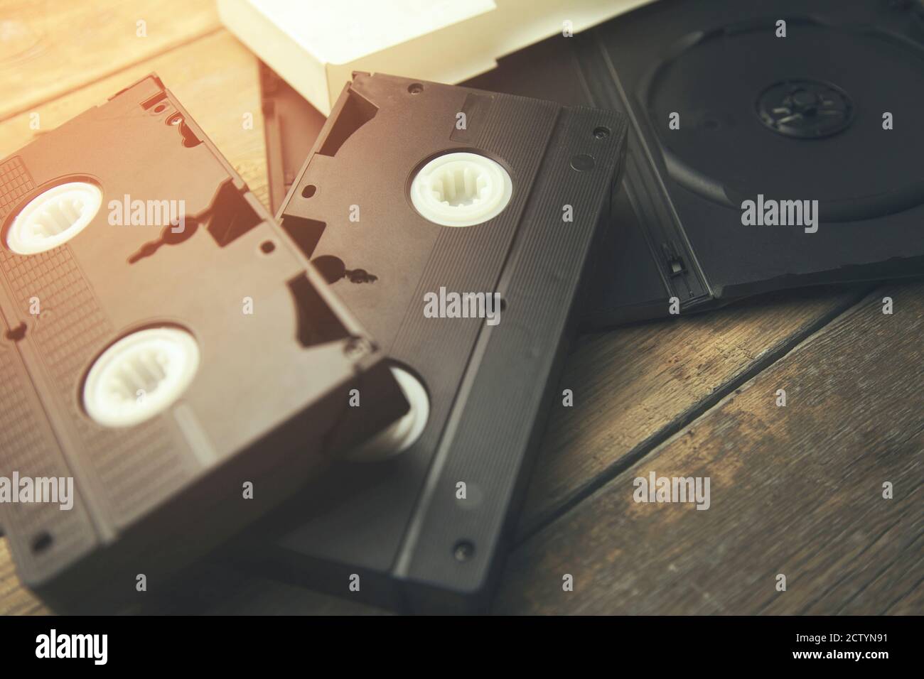 old retro video tape over wooden table background Stock Photo - Alamy