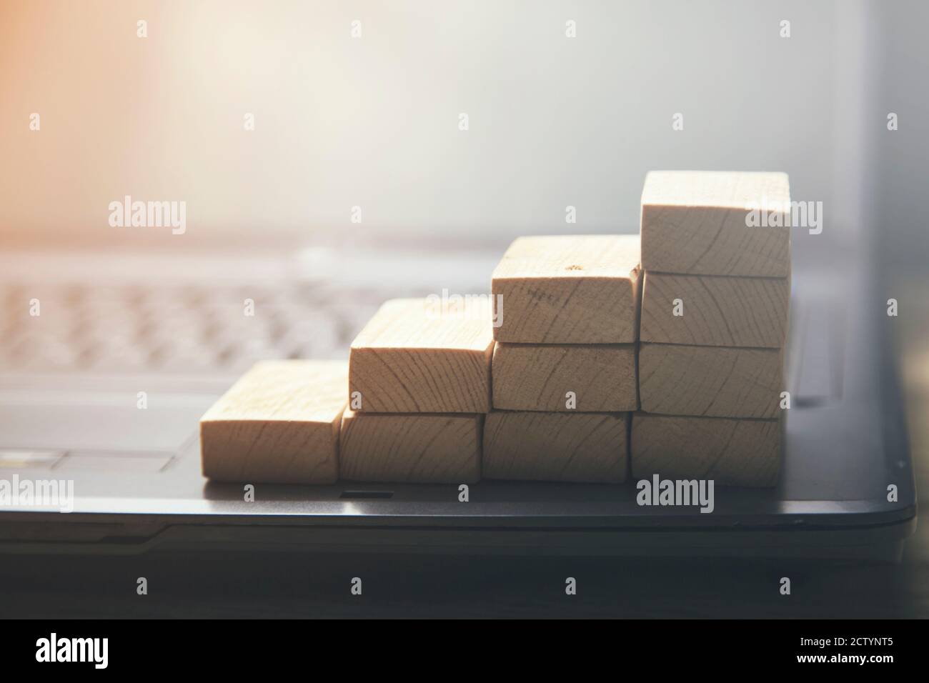 Stacks of Wooden Blocks on Computer Background Stock Photo - Alamy