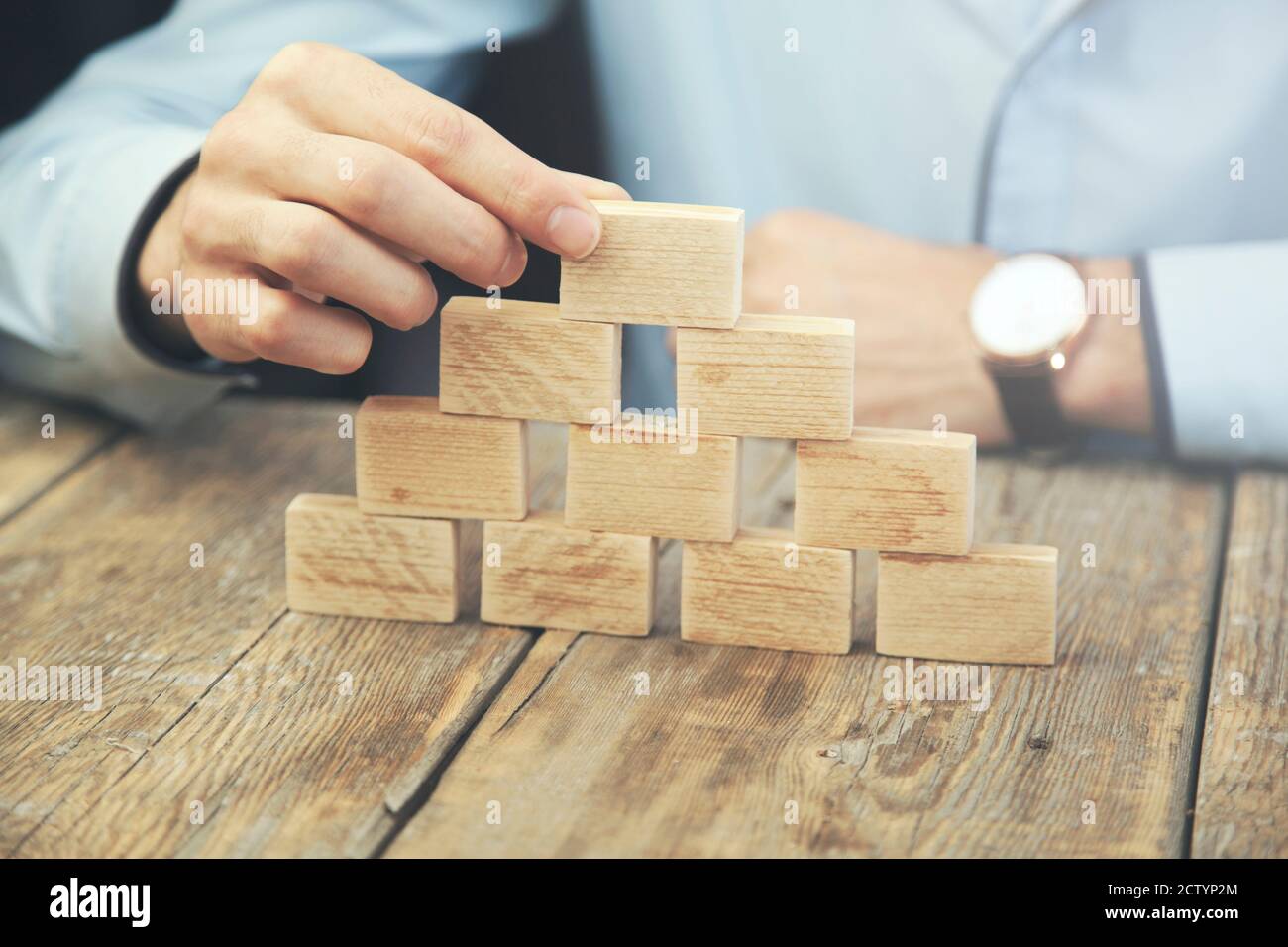 Block tower falling hi-res stock photography and images - Alamy