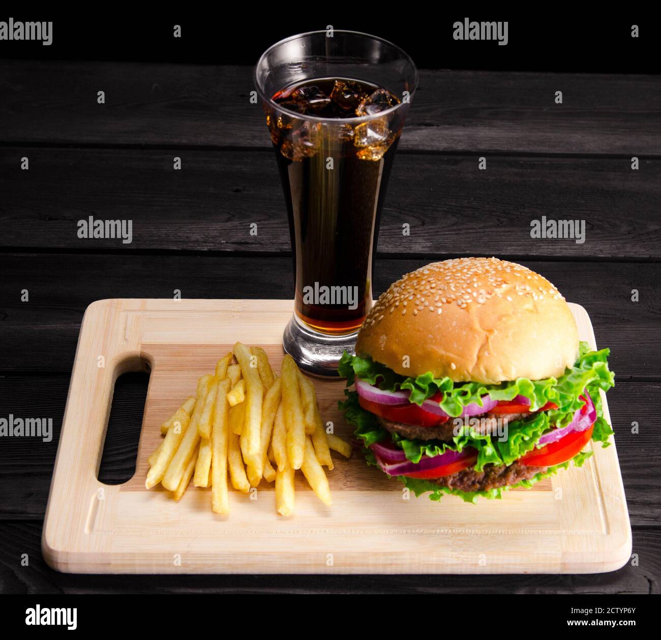 The burger served in bun in nutrition fast food concept Stock Photo - Alamy