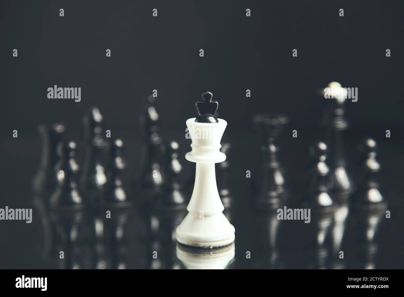 Fallen king pieces surrounded by the other color chess pieces Stock ...